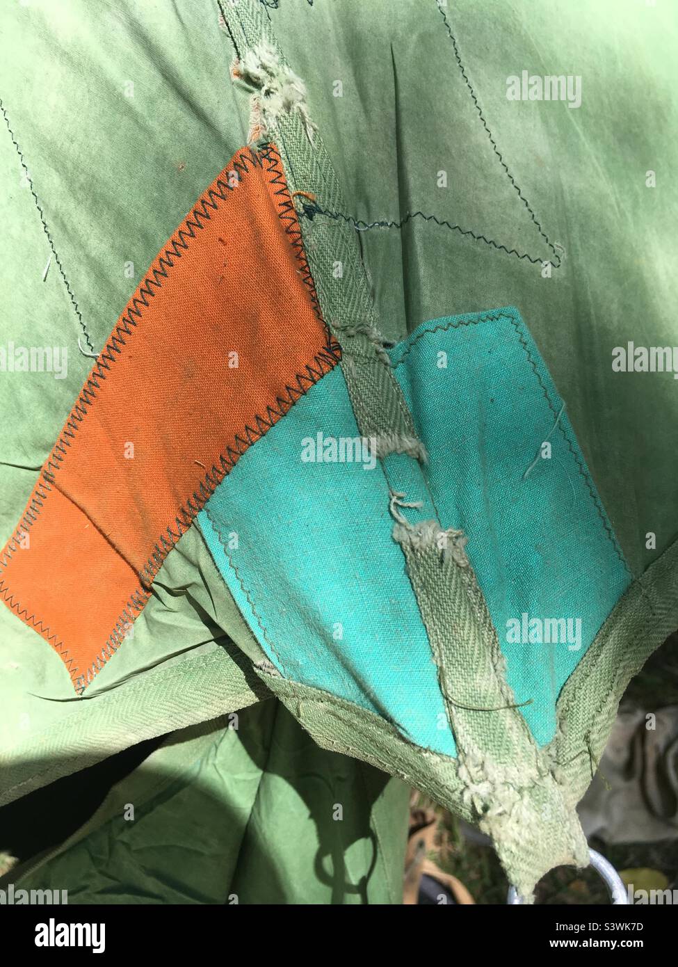 Patched tent hi-res stock photography and images - Alamy