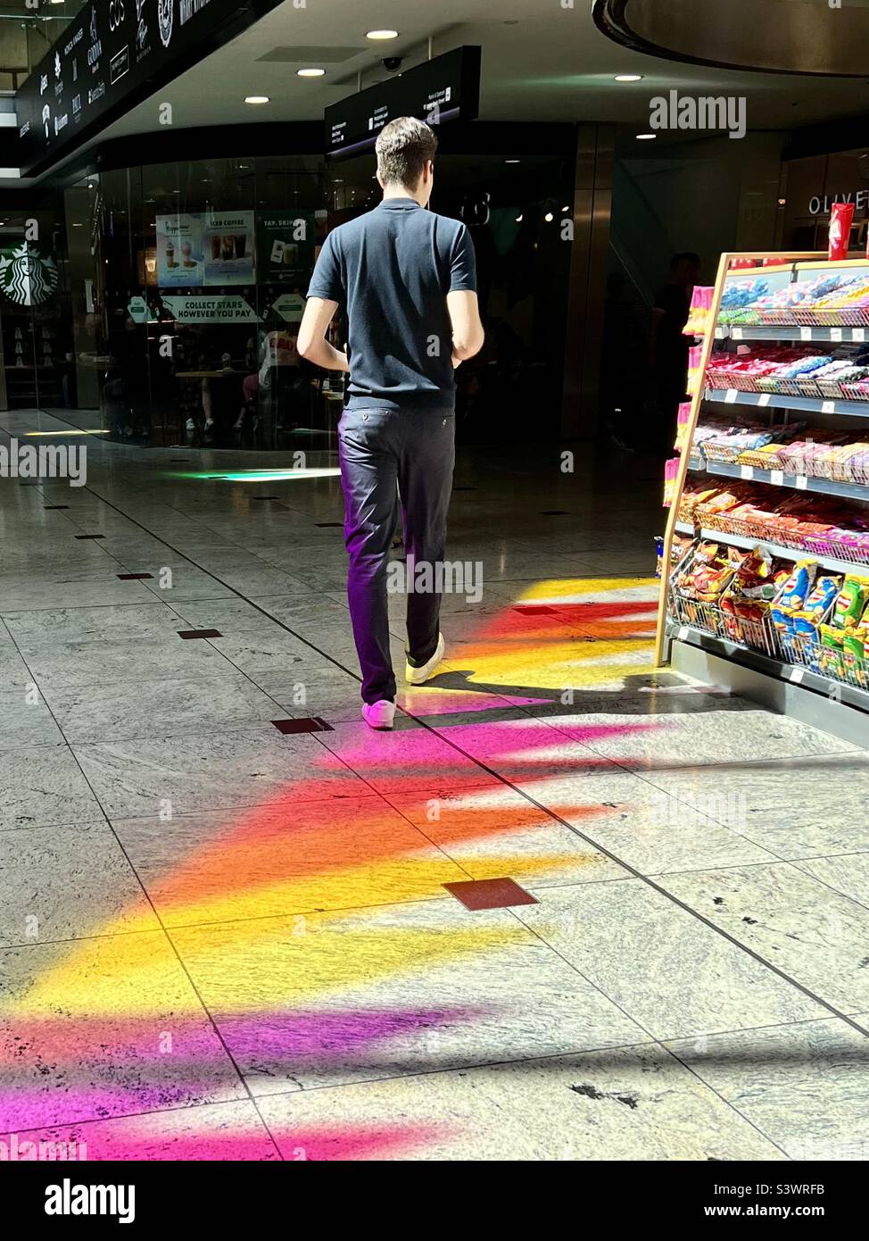 Walking the rainbow Stock Photo - Alamy