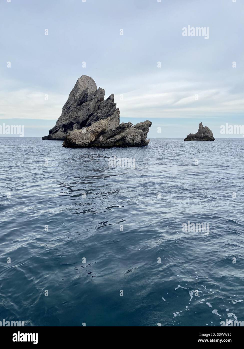 Boat trip to Meldes island on a story afternoon Stock Photo - Alamy