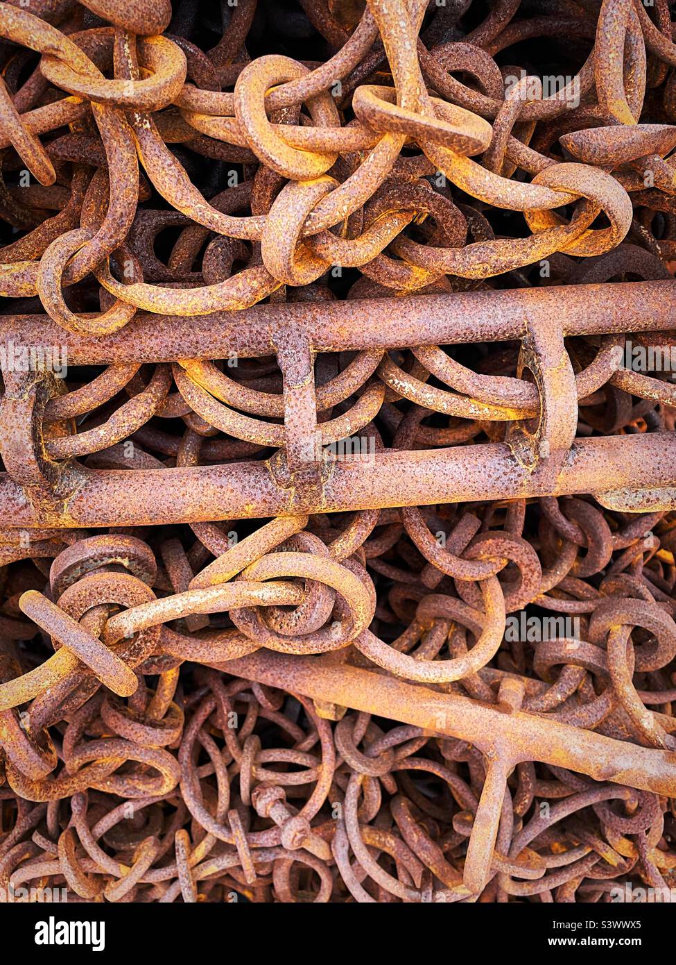 ‘Tried and Rusted’ rusted chains and hooks highlight the strains of ...