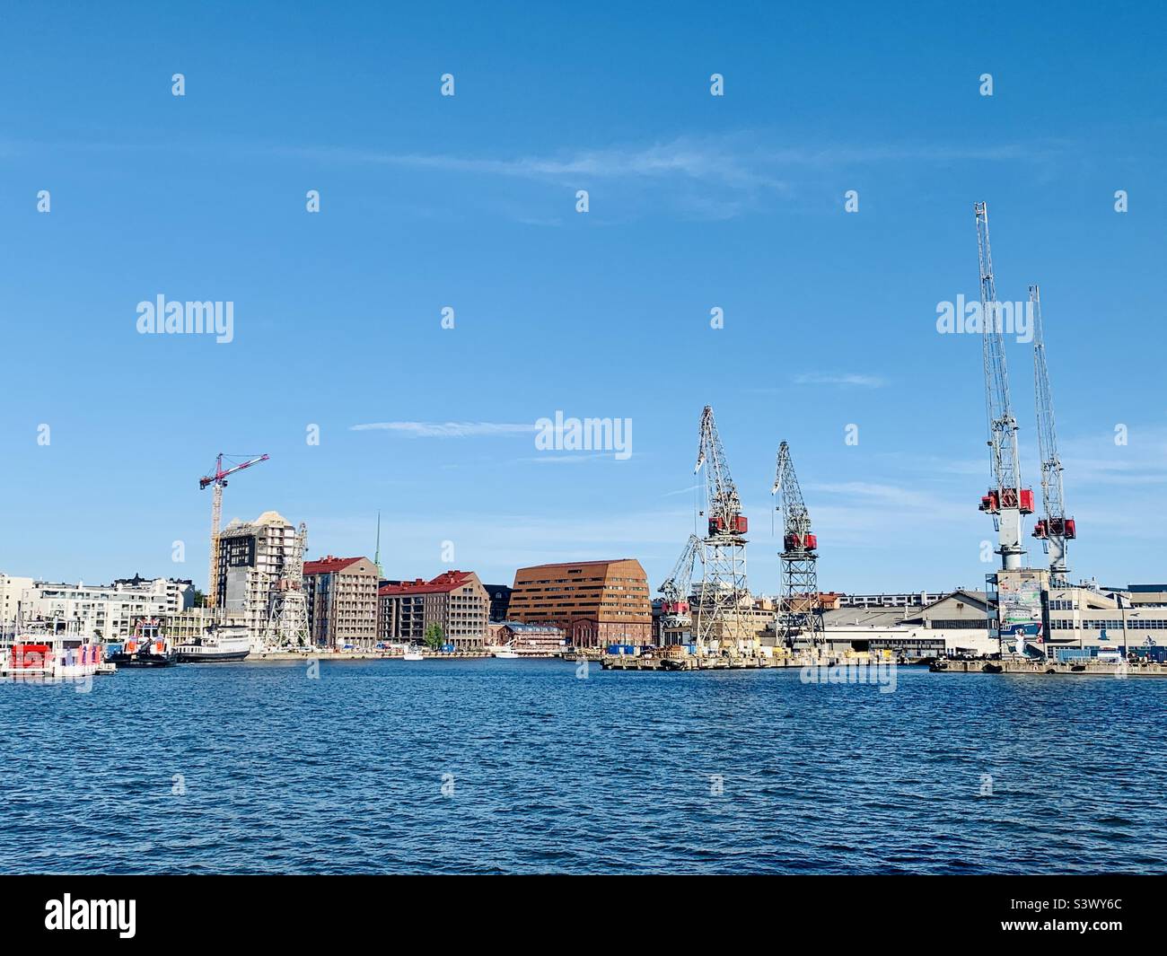 Helsinki cityscape with harbour and residential buildings in Finland ...