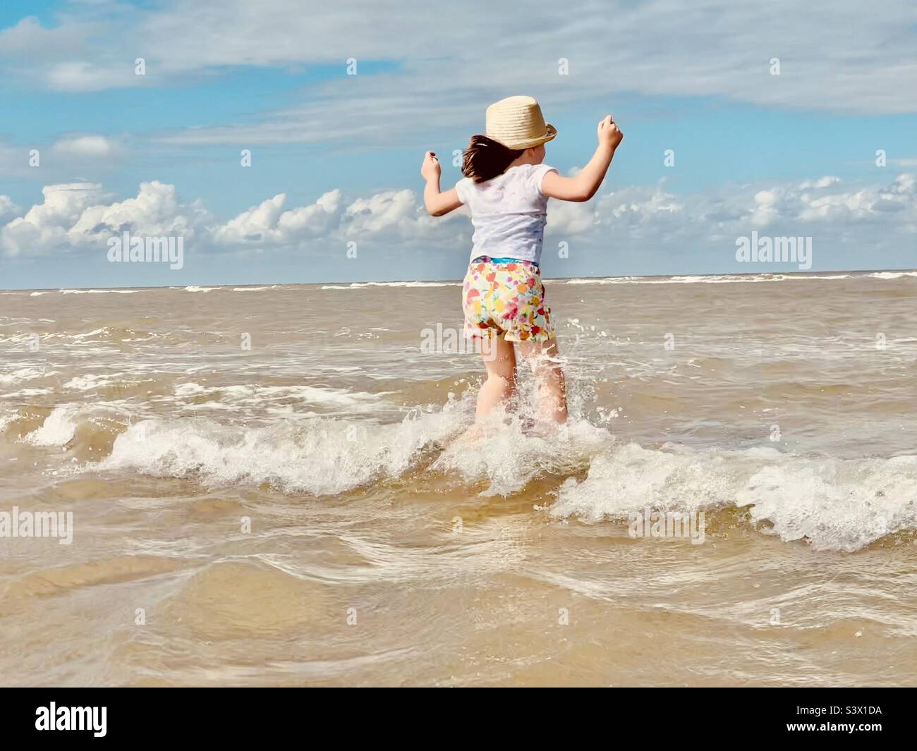 Girl waves hi-res stock photography and images - Alamy