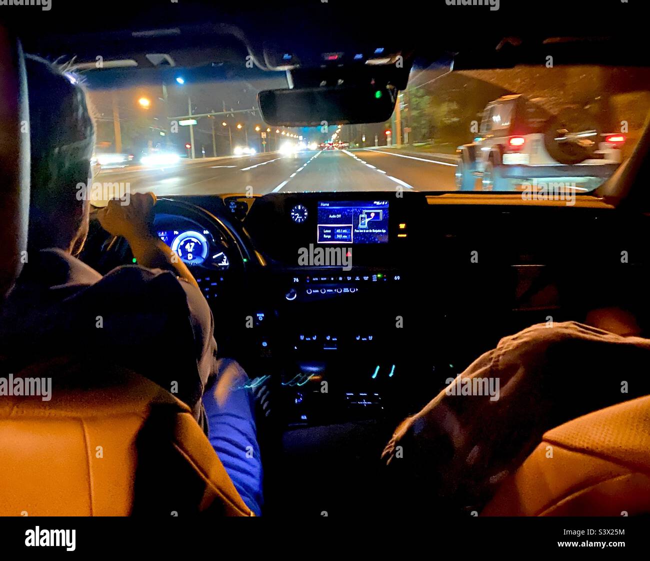 Night driving shot from the inside of a car with a lit dashboard Stock ...