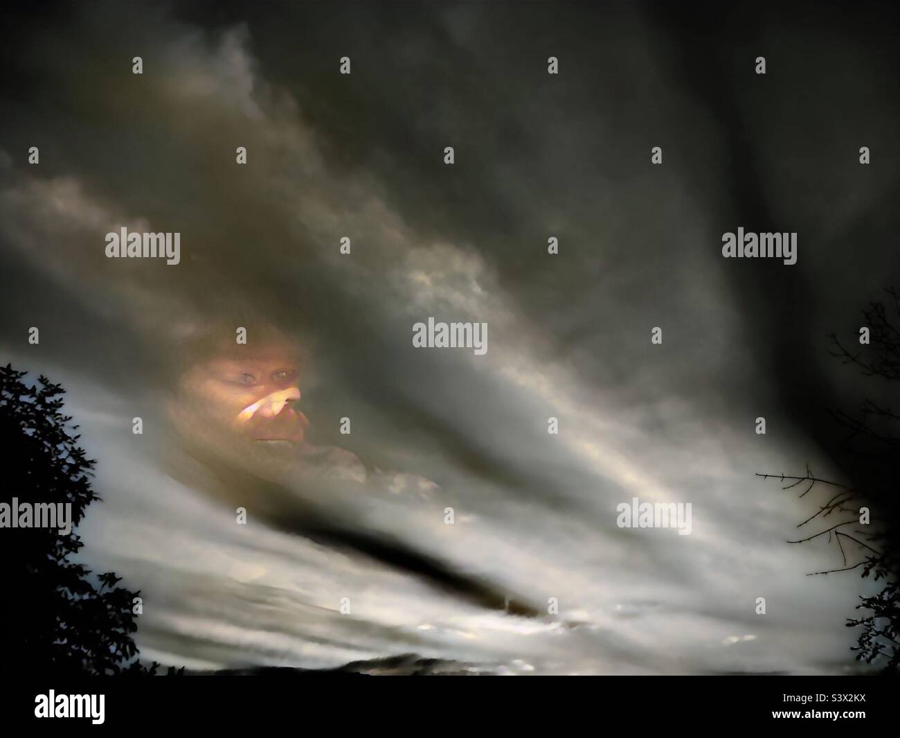 Halographic face captured in clouds as a front moved through. Very strange and rare phenomena ...