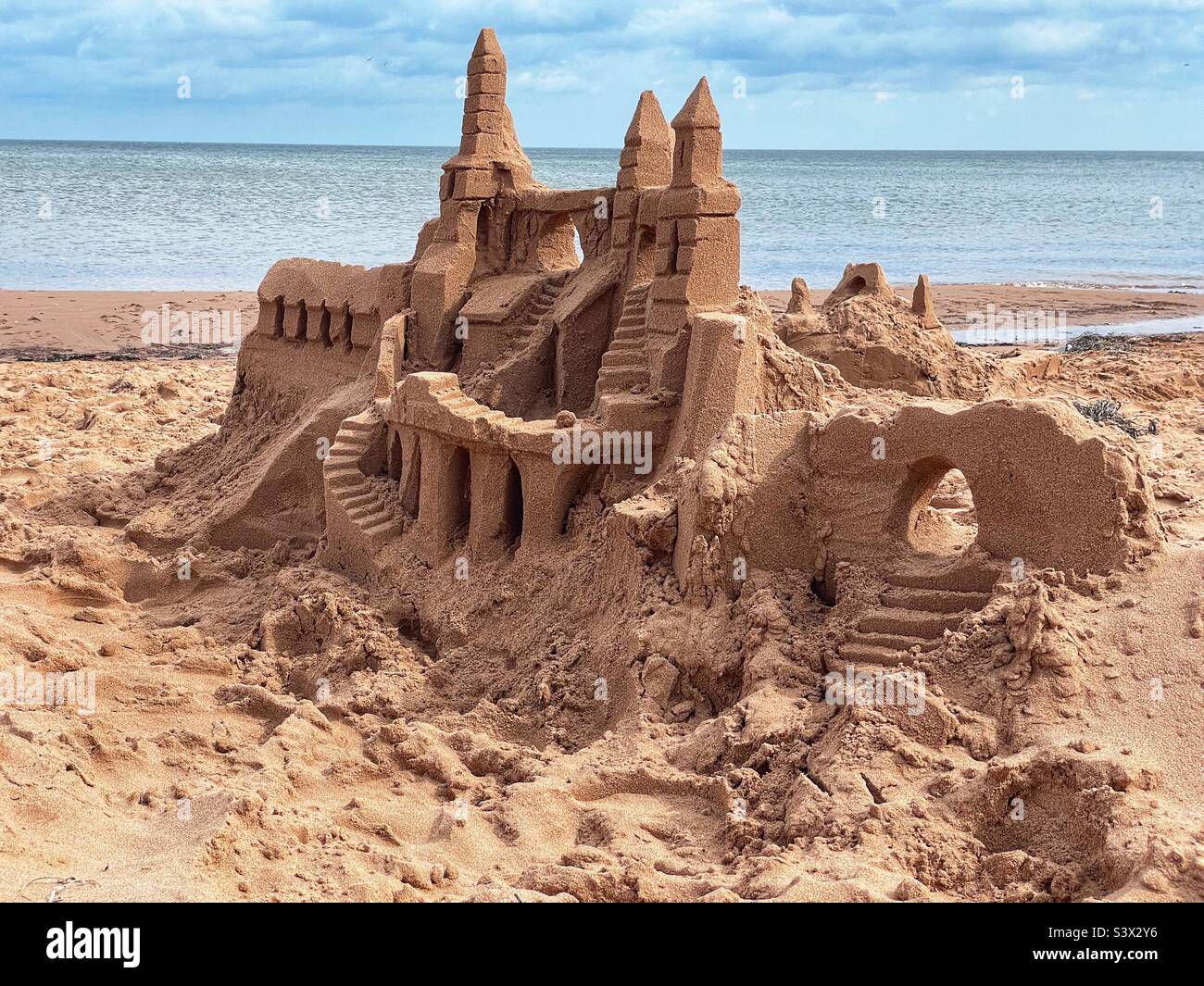 Elaborate sandcastle at the beach Stock Photo - Alamy