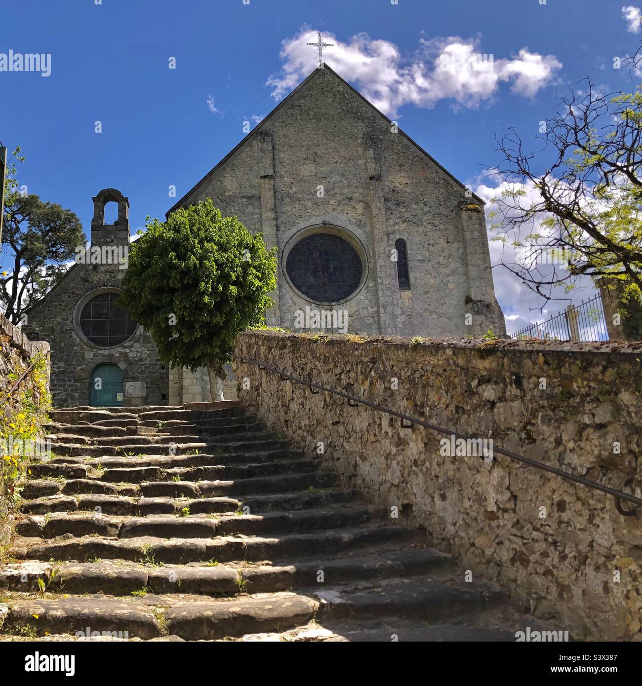 Ancient steps lead up to an old church in rural France Stock Photo - Alamy