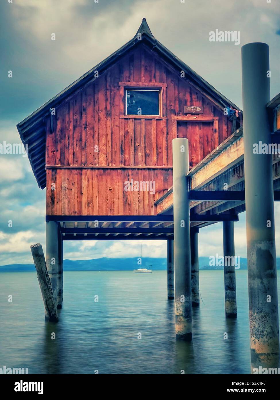 House on the lake on struts Stock Photo - Alamy
