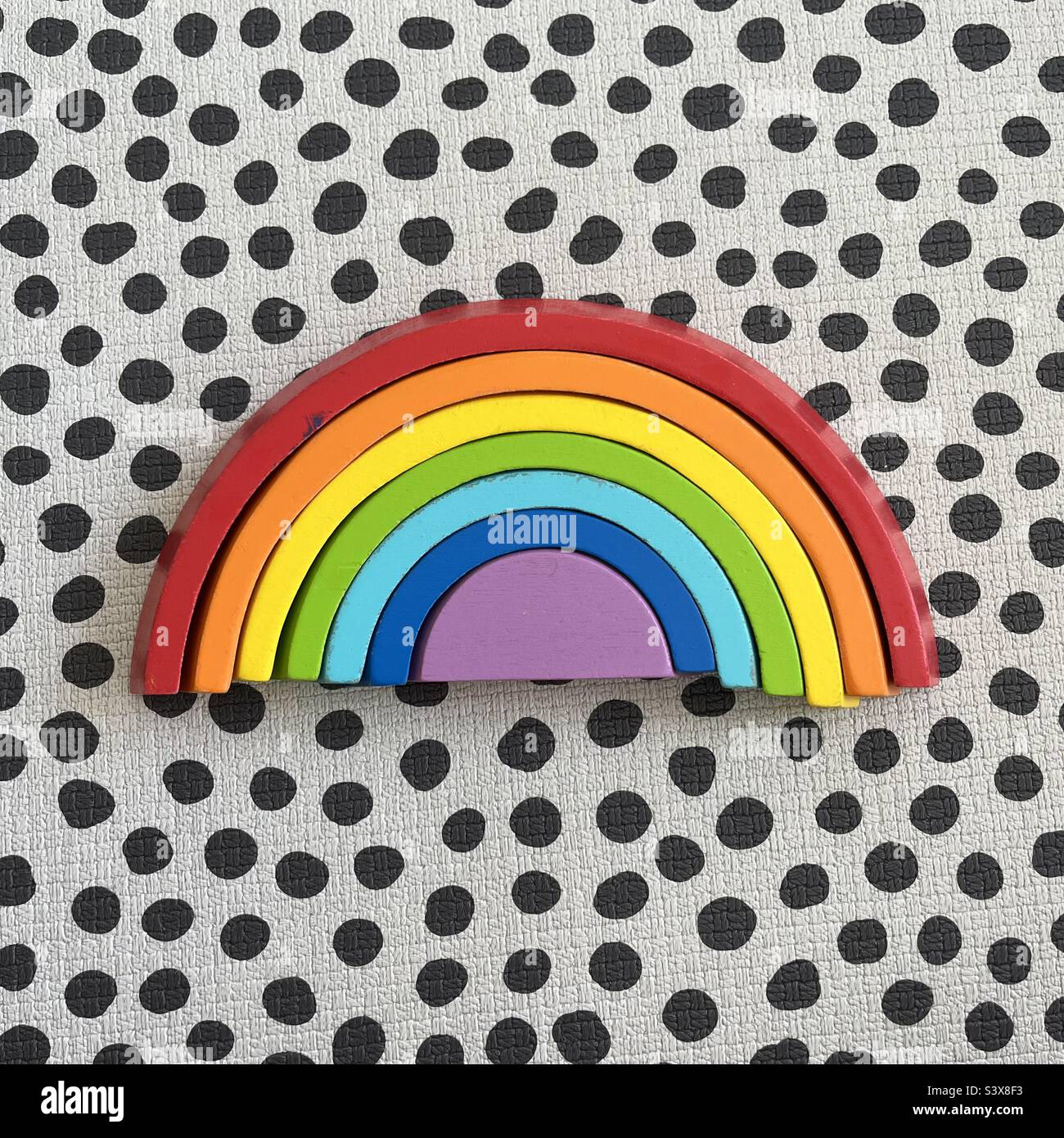 Toy wooden rainbow puzzle hi-res stock photography and images - Alamy