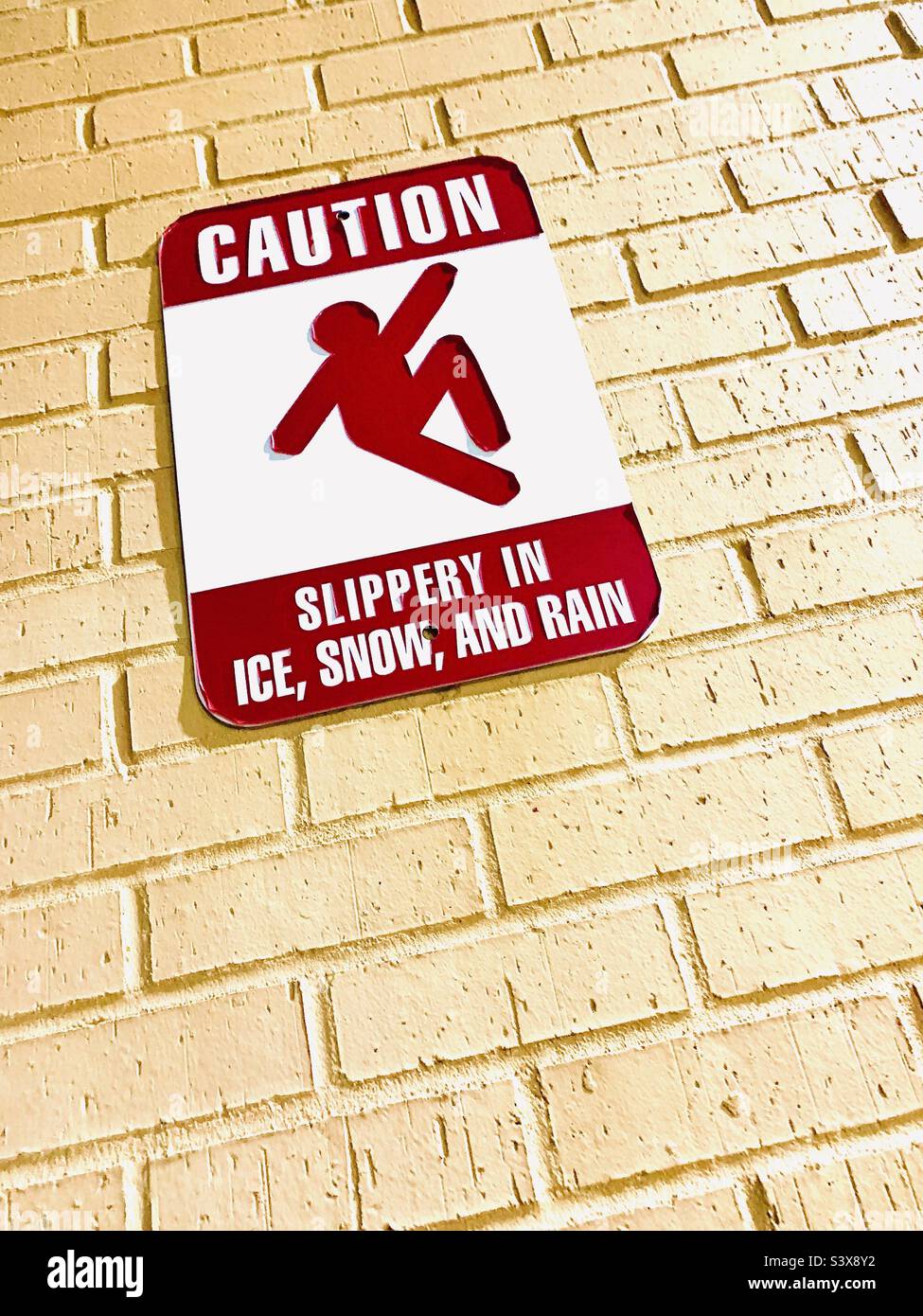 Caution Sign. Slippery When Wet Stock Photo - Alamy