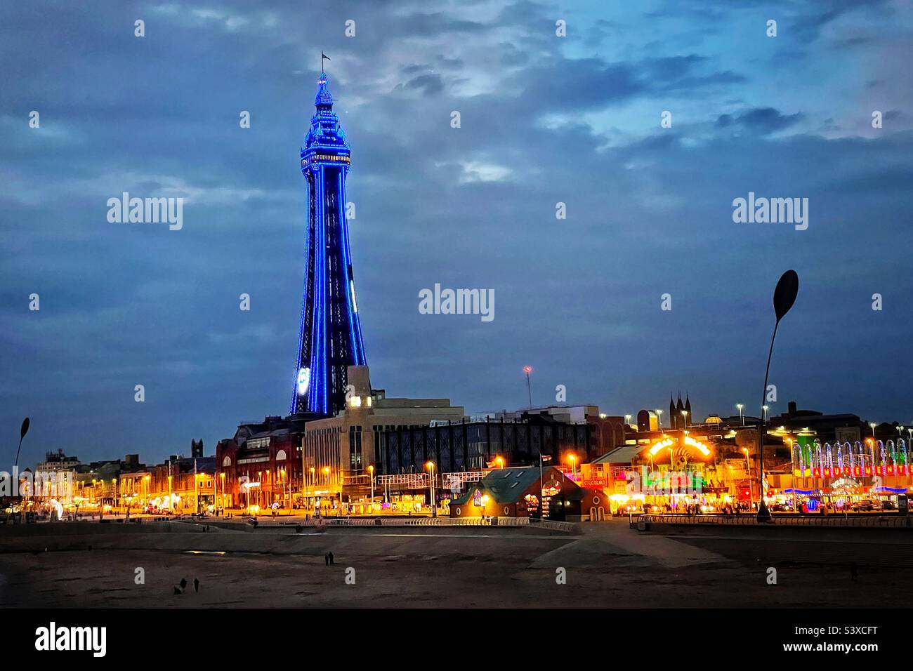 Blackpool promenade and Tower lit up at night Stock Photo - Alamy