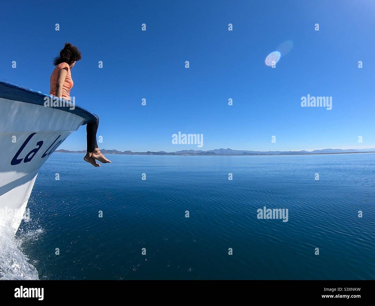 Woman riding boat hi-res stock photography and images - Alamy