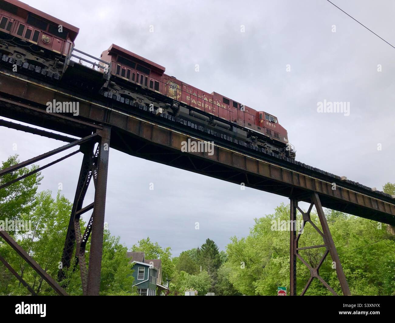 Train passing on bridge in nature Stock Photo - Alamy