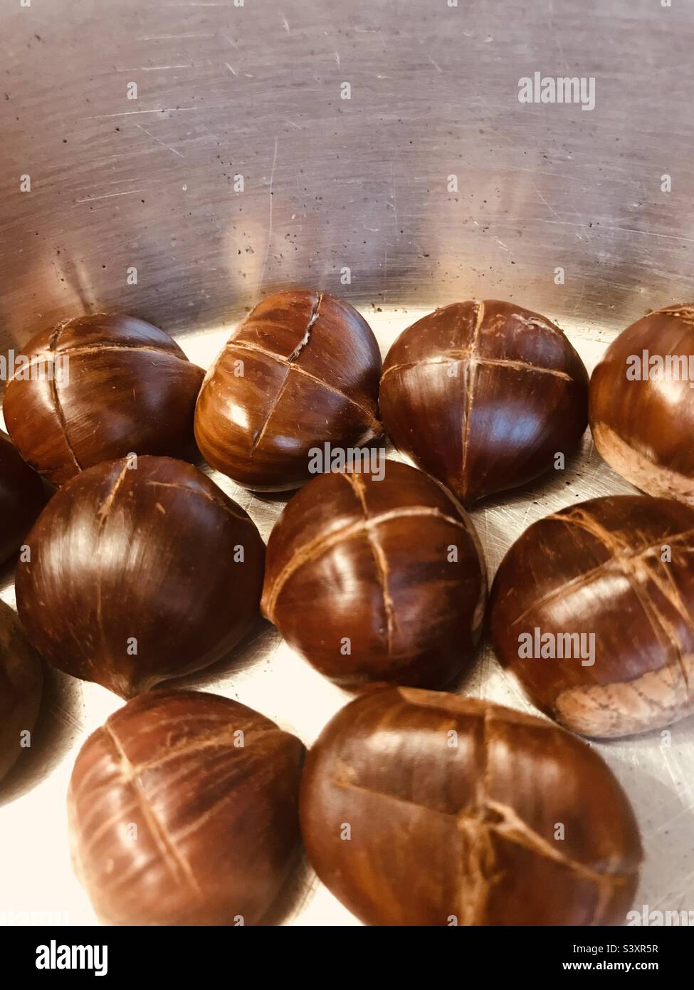 chestnut prepared for roasting Stock Photo - Alamy