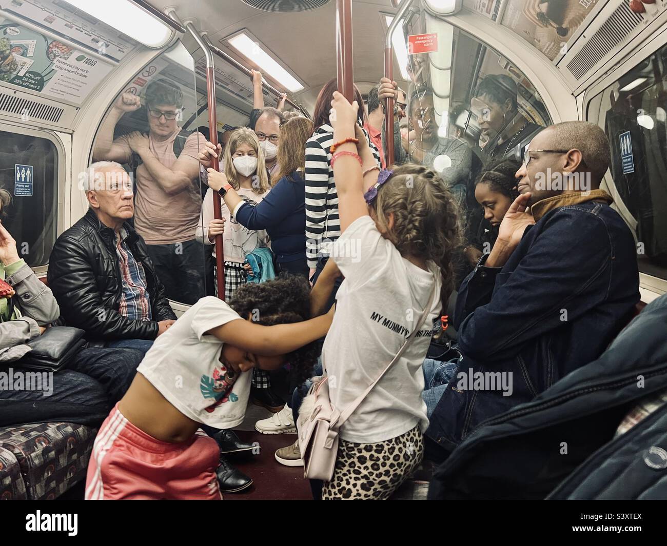 Crowded London Underground tube train during london marathon Stock ...
