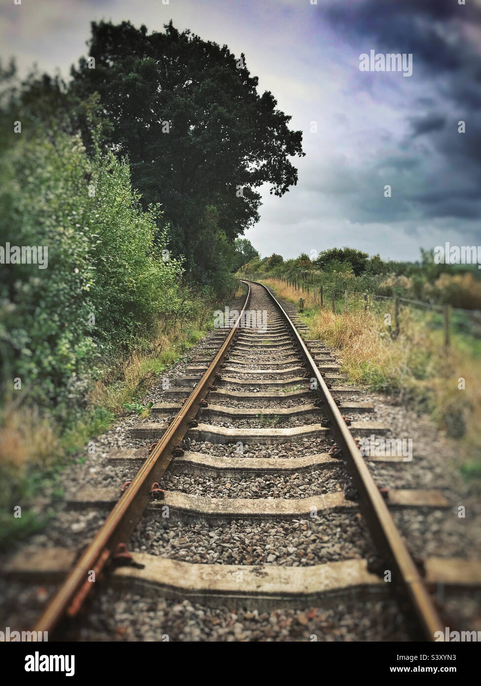 A railway line going into the distance Stock Photo - Alamy