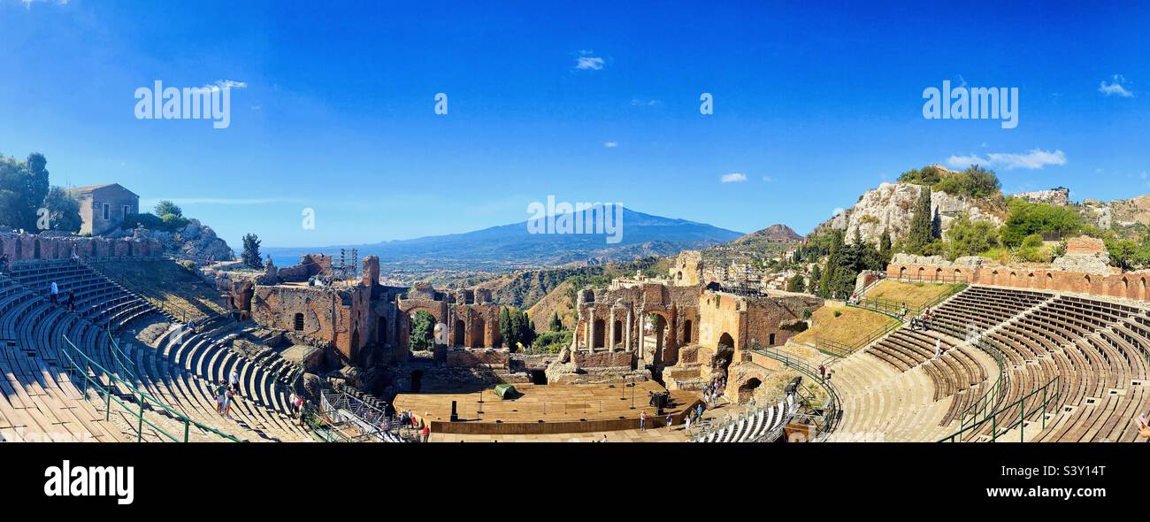 The Roman amphitheatre in Taormina Sicily with Mt Etna in the ...