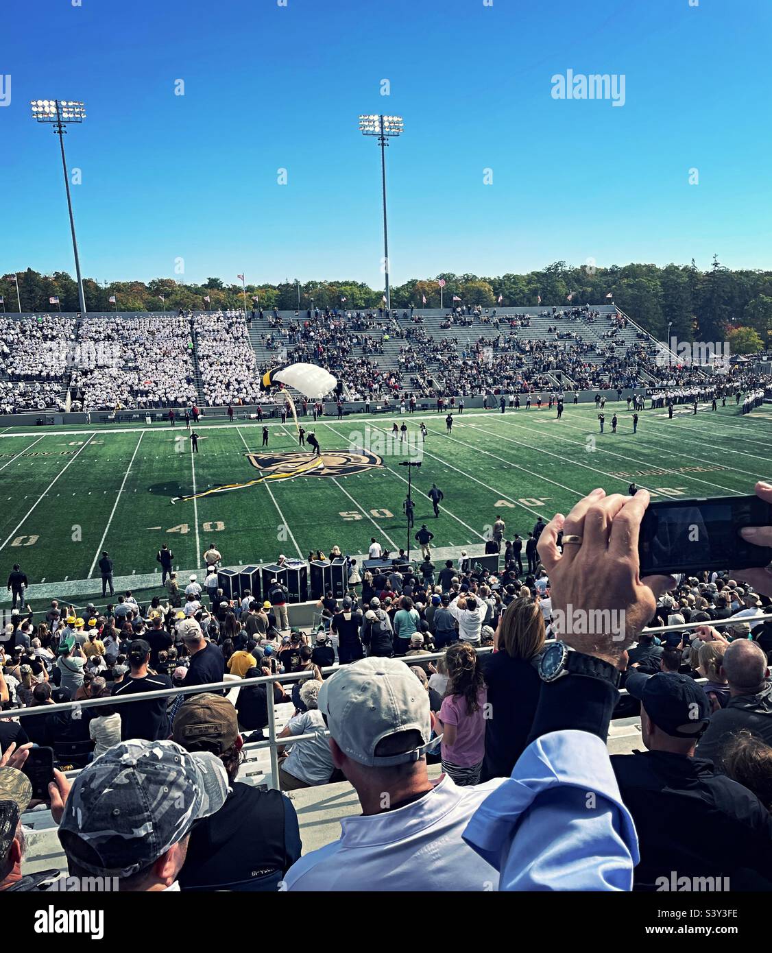 The game ball being delivered by parachute at west point during the ...