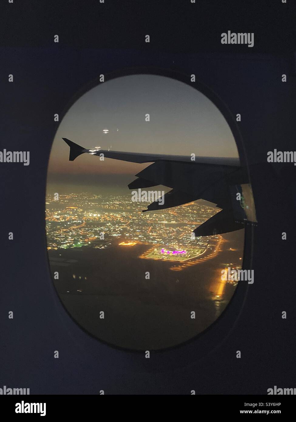 View from an airplane window as it lands at Hamad International Airport ...