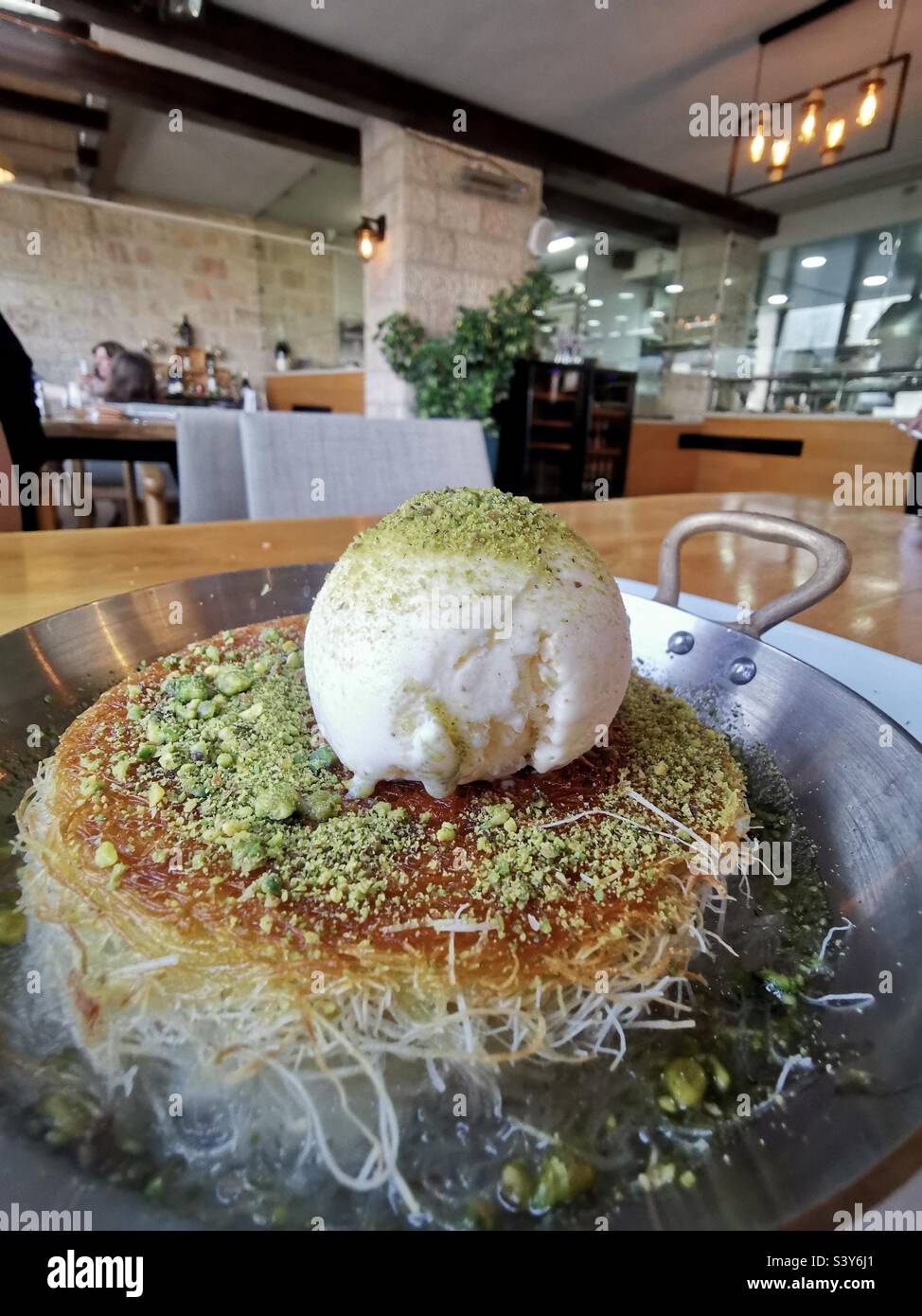 Knafe with ice cream Stock Photo - Alamy