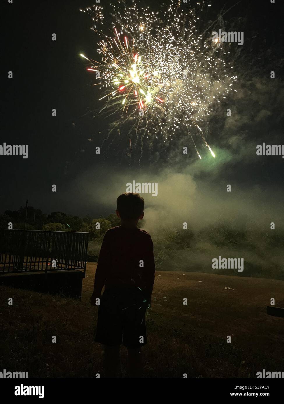 Boy watching fireworks hi-res stock photography and images - Alamy