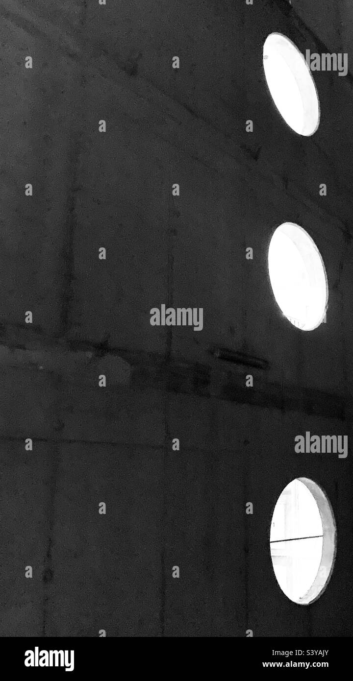 Circular cement window pattern Stock Photo - Alamy