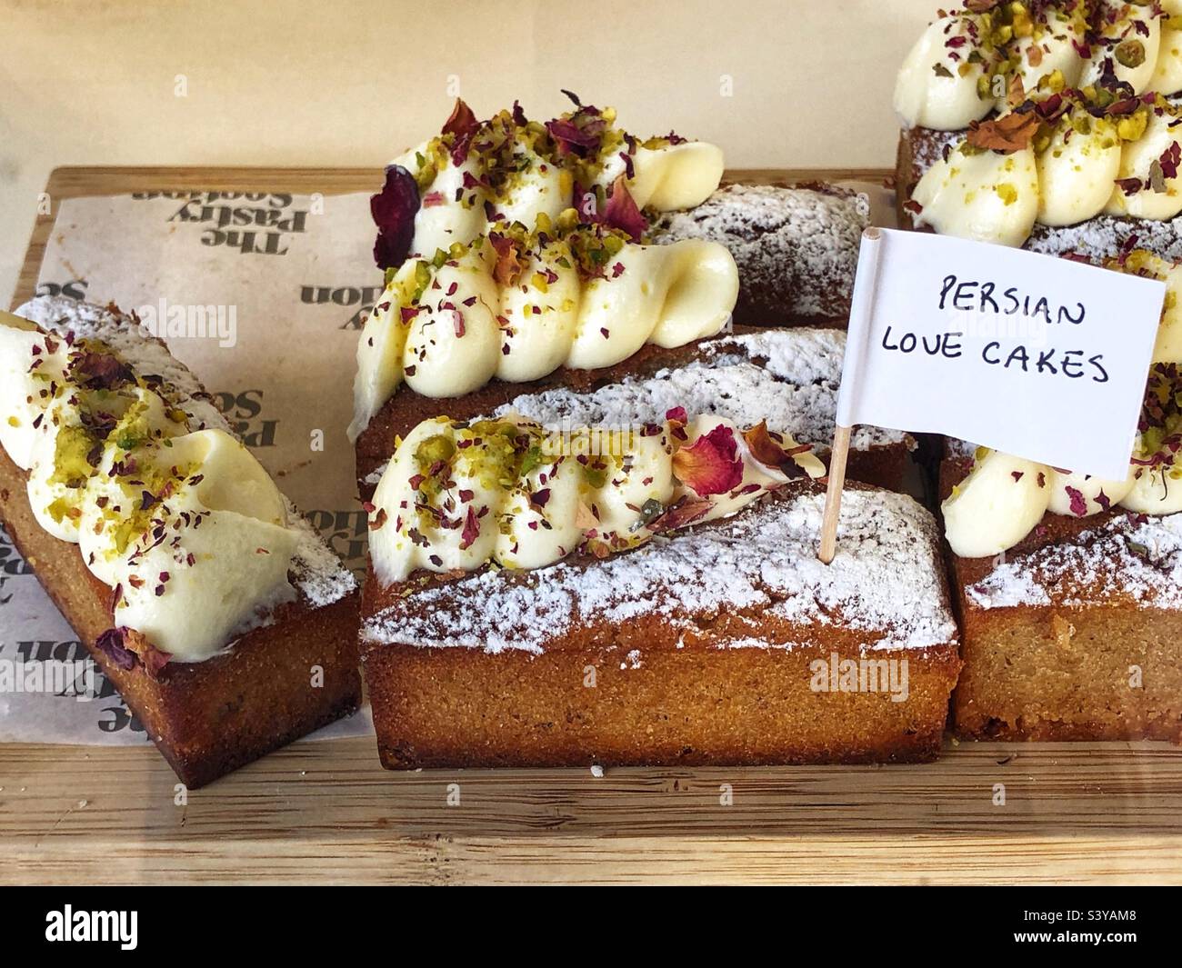 Persian love cakes in bakery shop window Stock Photo - Alamy
