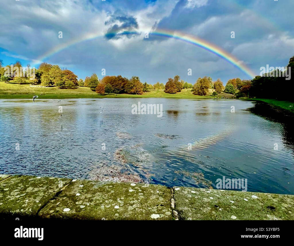 A spectacular rainbow over a lake in Yorkshire, England, UK Stock Photo ...