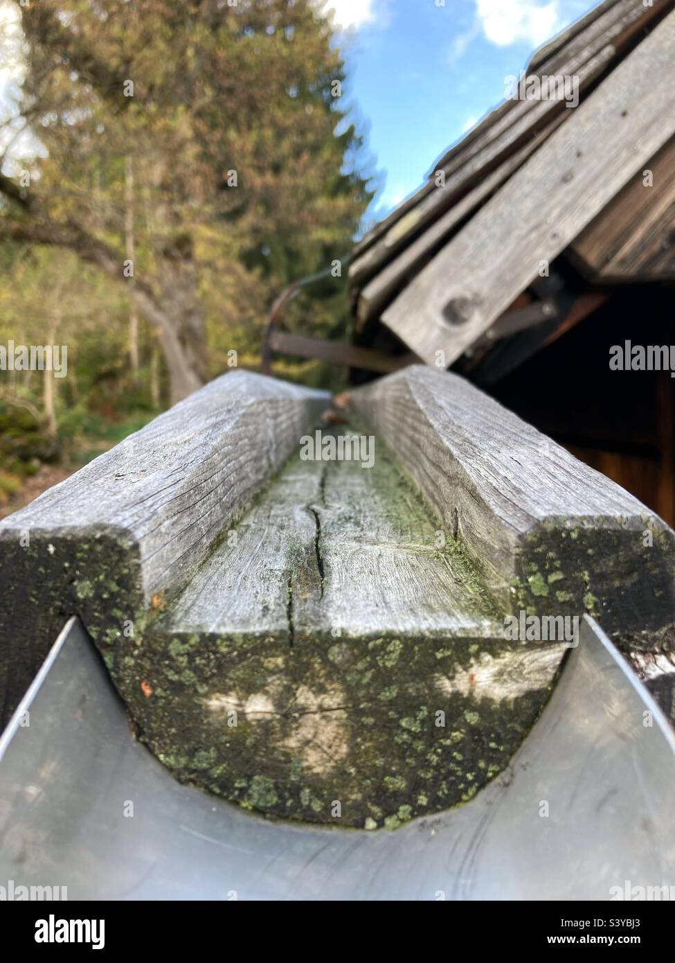 Wooden rain gutter on a house in the German Alps Stock Photo - Alamy