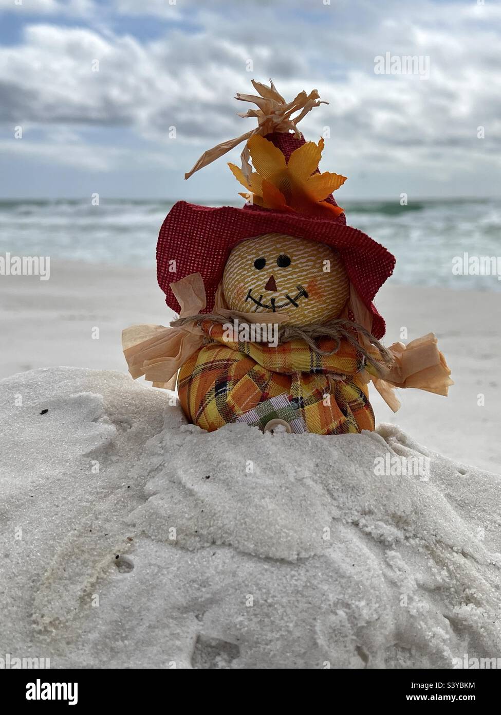 Scarecrow with white beach backyard Stock Photo - Alamy