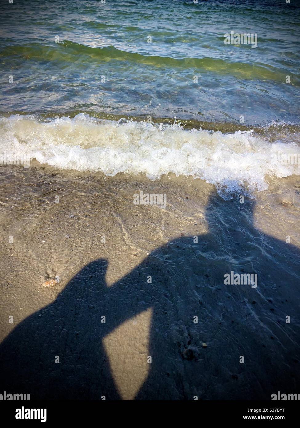 Shadow on the beach hi-res stock photography and images - Alamy