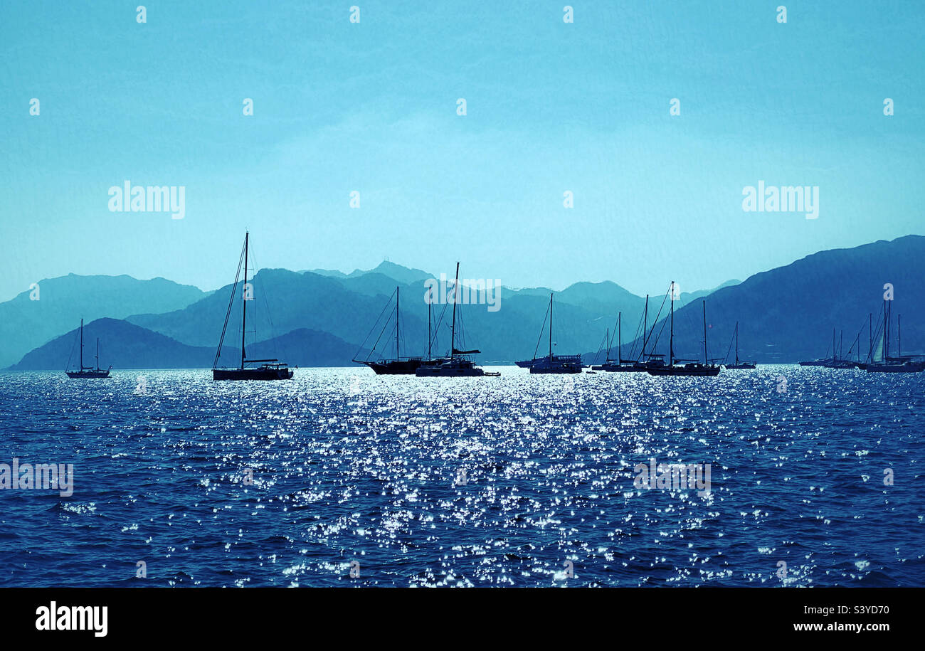 A summer scene somewhere over the Mediterranean Sea, with yachts ...