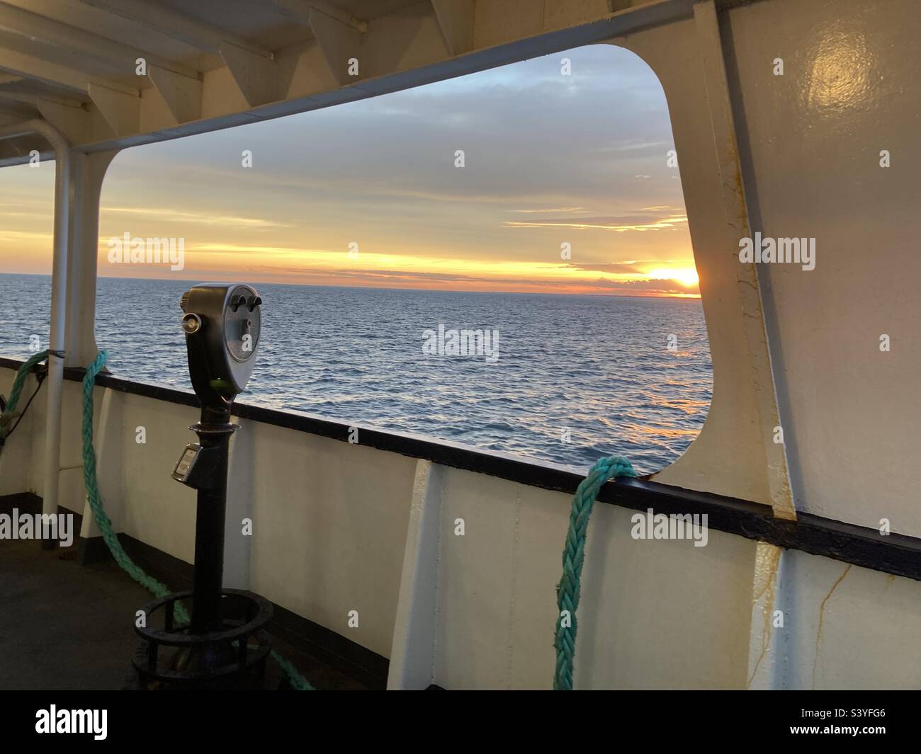 Long Island Sound, USA - August 16, 2022: Sunset through large, ferry ...