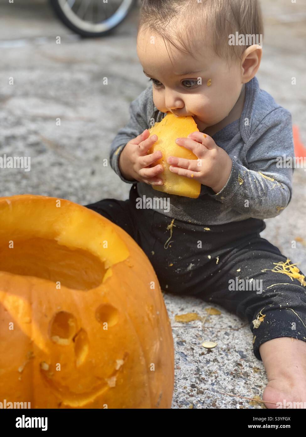 Baby eating hi-res stock photography and images - Alamy