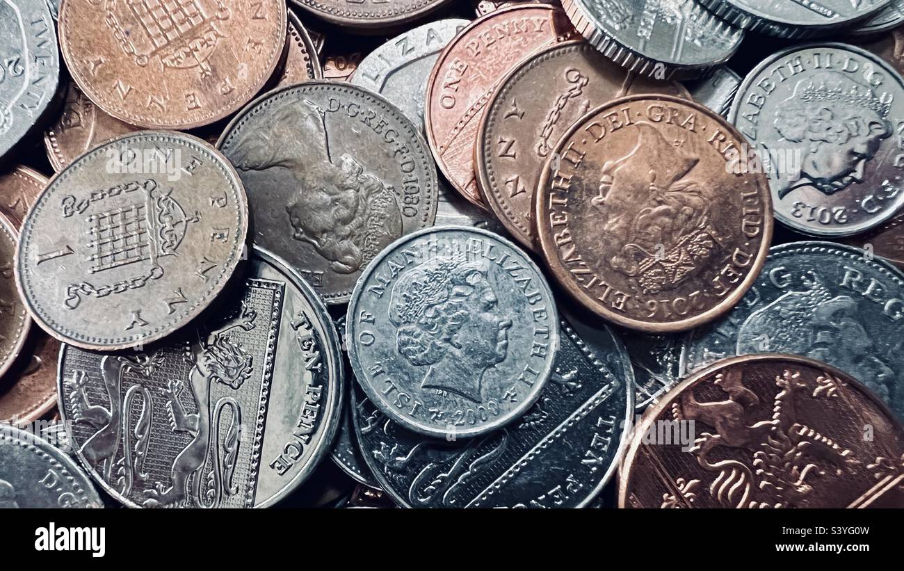 Random heap of small denomination bronze and silver coins Stock Photo ...