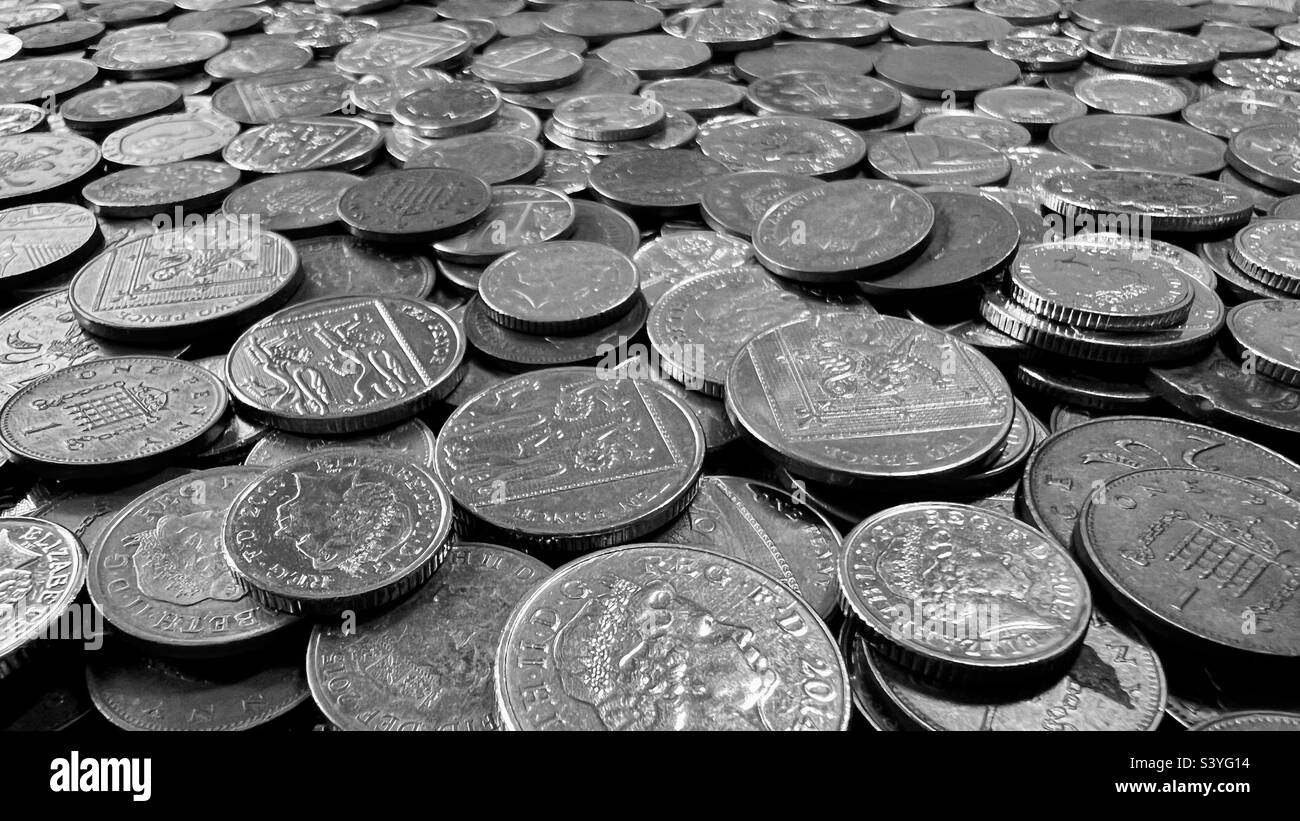 Random heap of small denomination bronze and silver coins Stock Photo ...