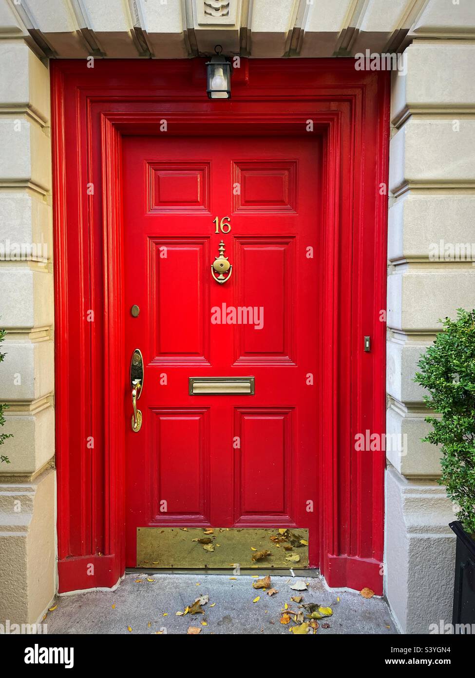 Close up of a bright red door in the Murray Hill historic district in ...