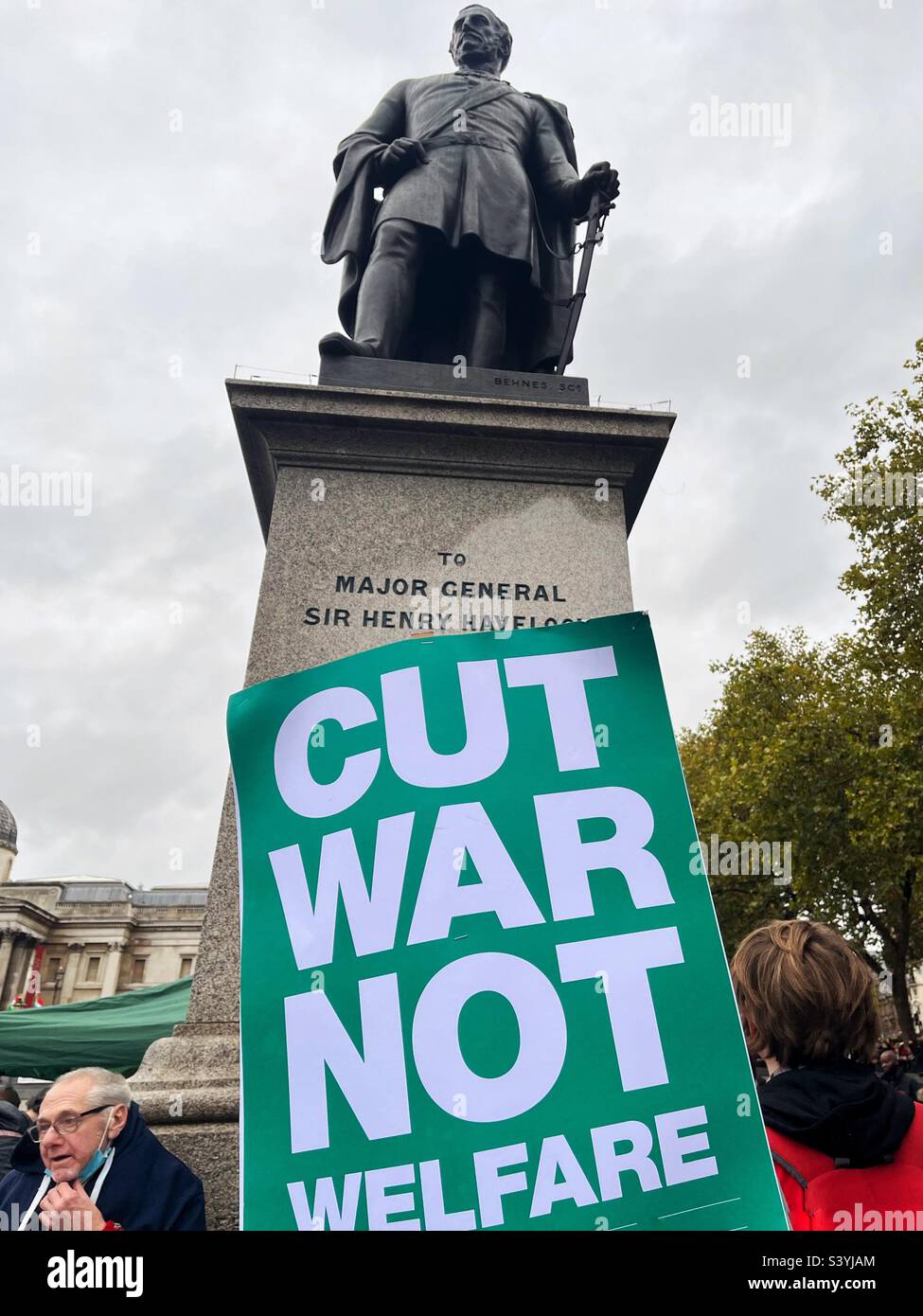 Placard reads: ‘Cut War Not Welfare’ in Trafalgar Square, the London ...