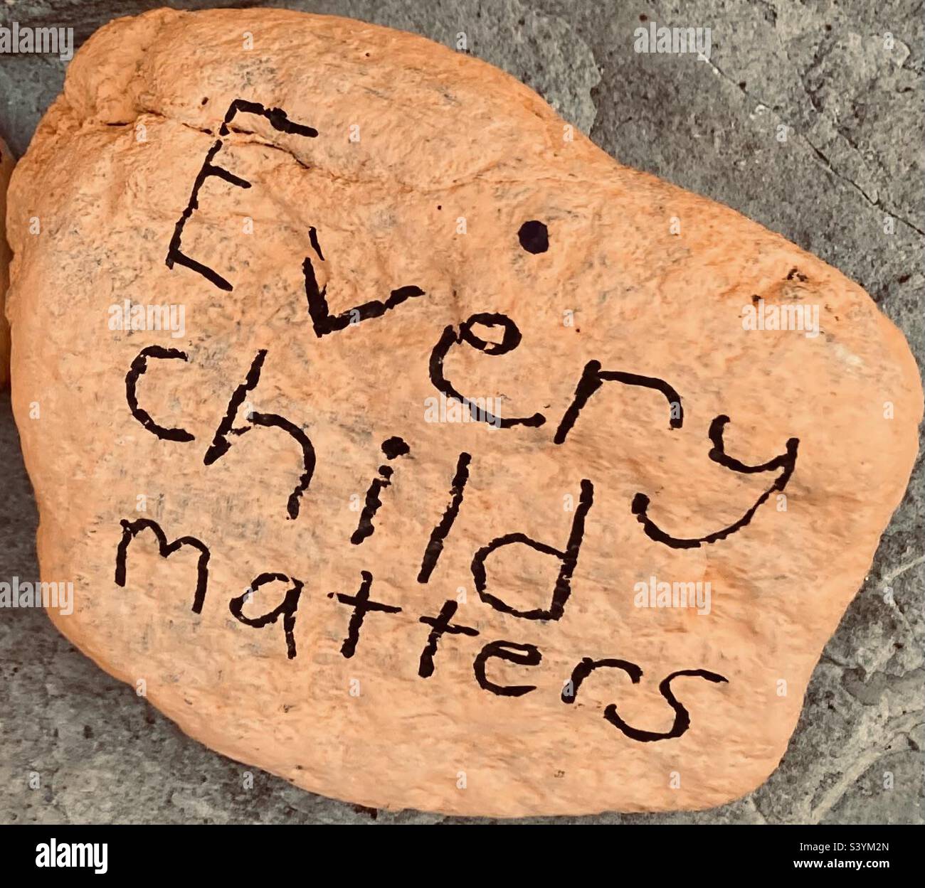 Every Child Matters on an orange stone in recognition of Indigenous ...
