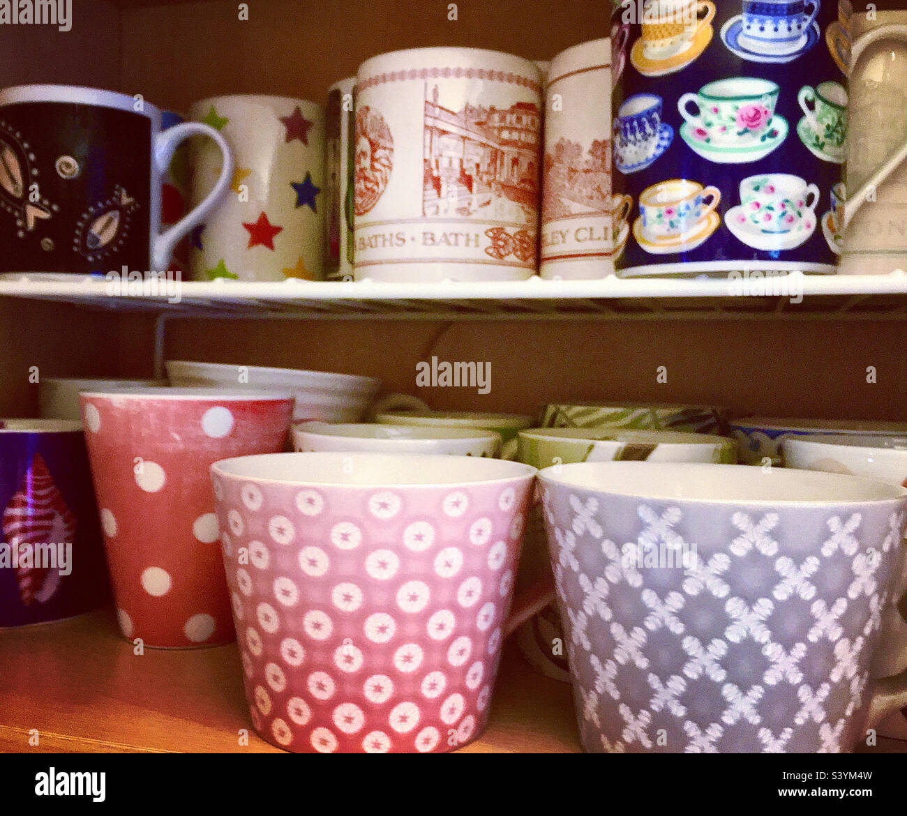 Domestic Kitchen Cupboard Full Of Well Used Mugs, UK Stock Photo - Alamy