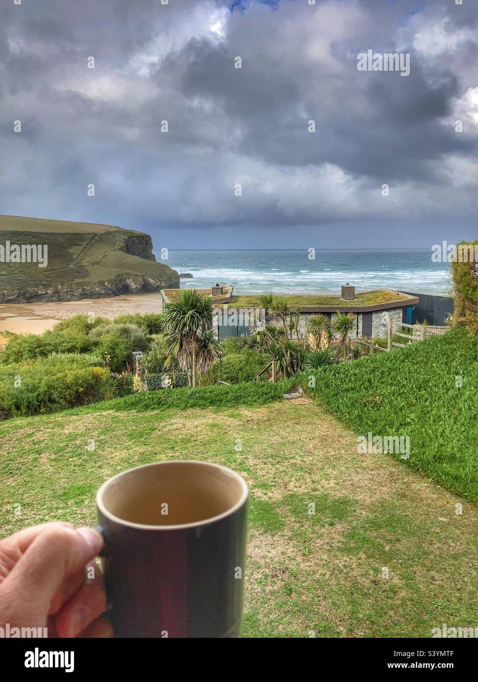 Coffee with a view at Mawgan Porth Cornwall Stock Photo - Alamy
