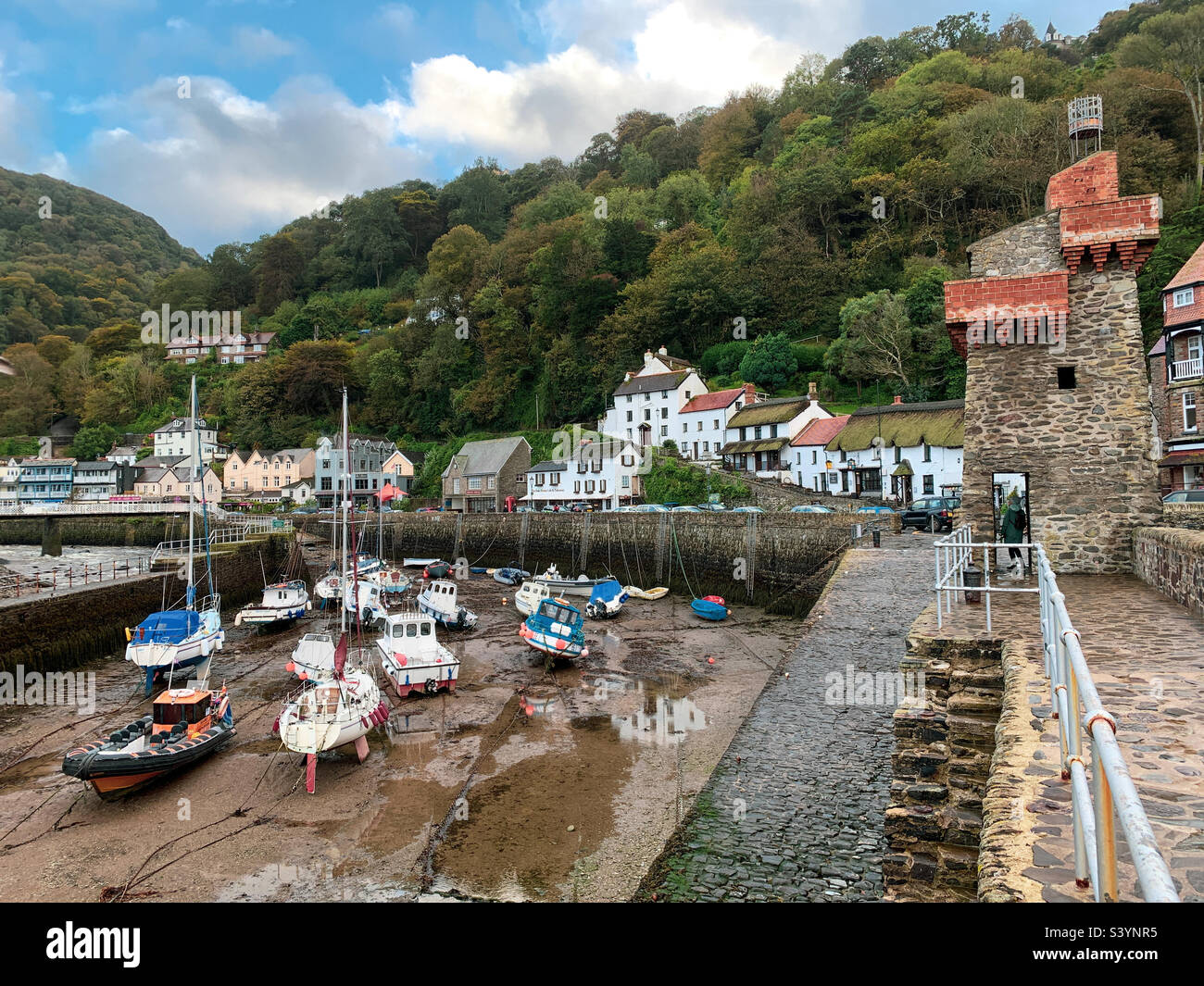 Autumn sunshine and low tide at Lynmouth Harbour, North Devon Stock ...