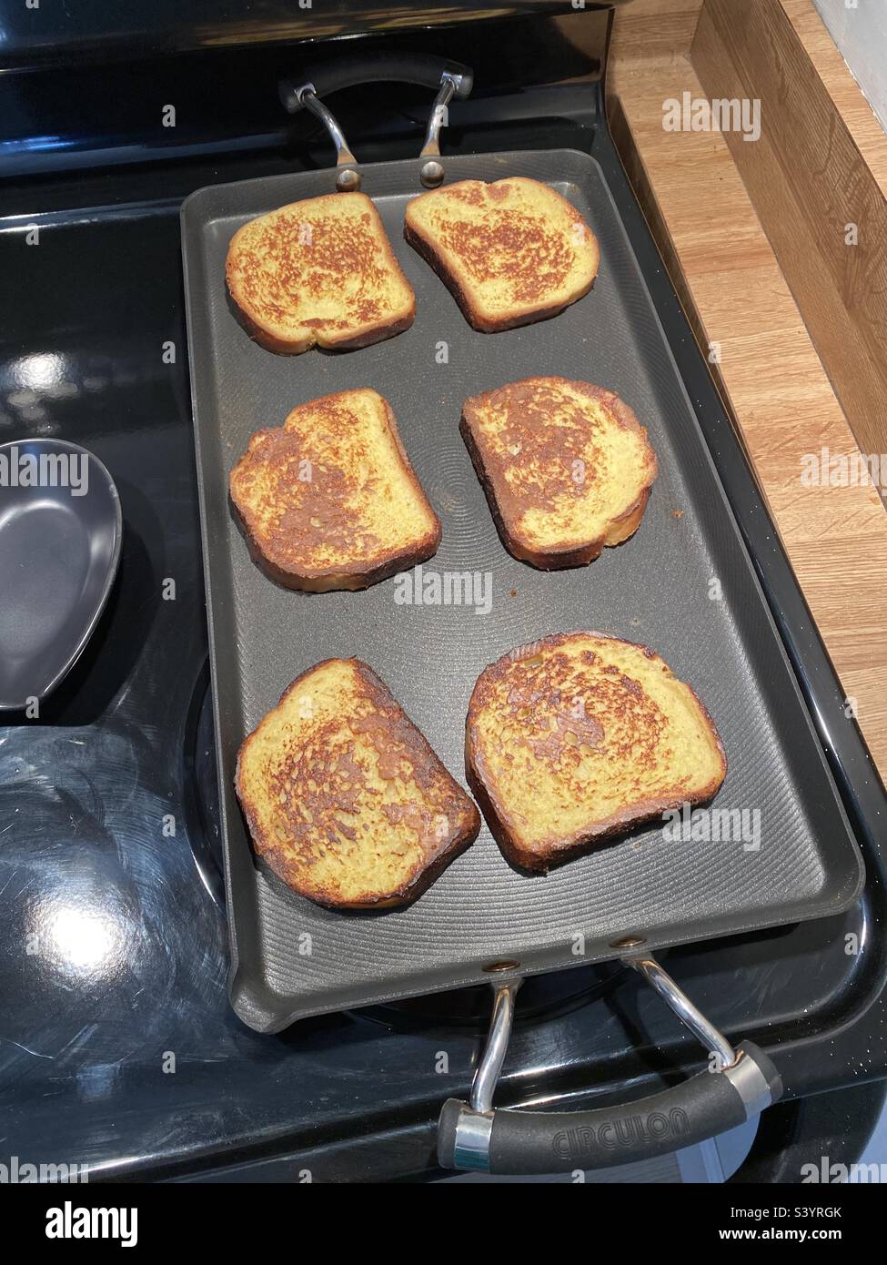 French toast on a griddle Stock Photo - Alamy