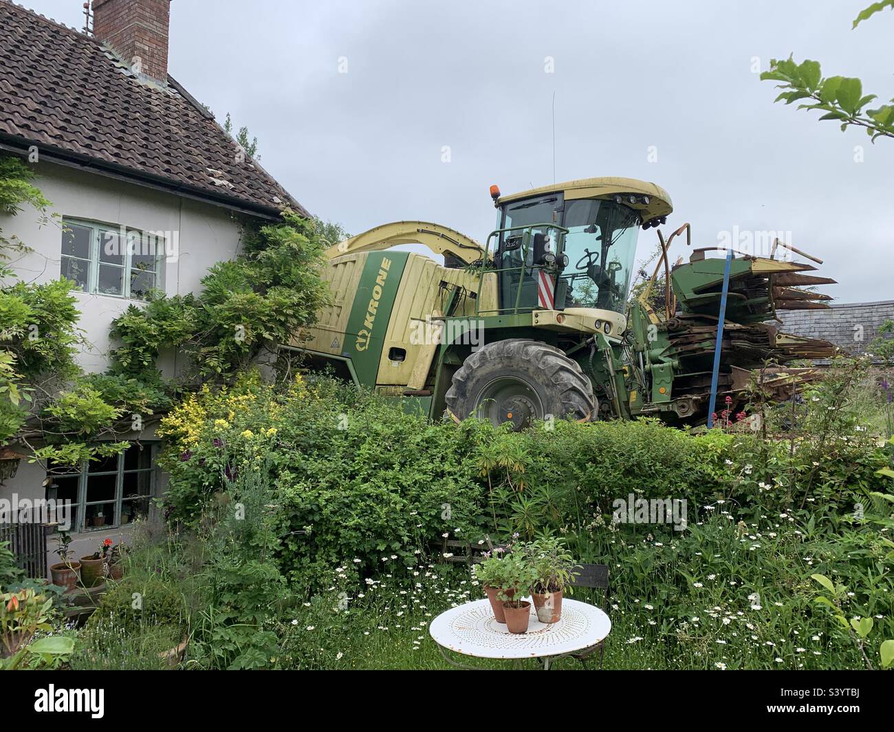 Taller than a house yellow tractor hi-res stock photography and images ...