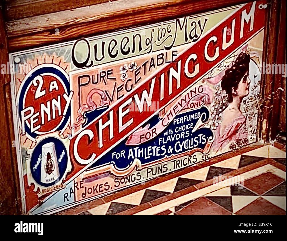 Retro advertising display for chewing gum on a shop front with tiled ...