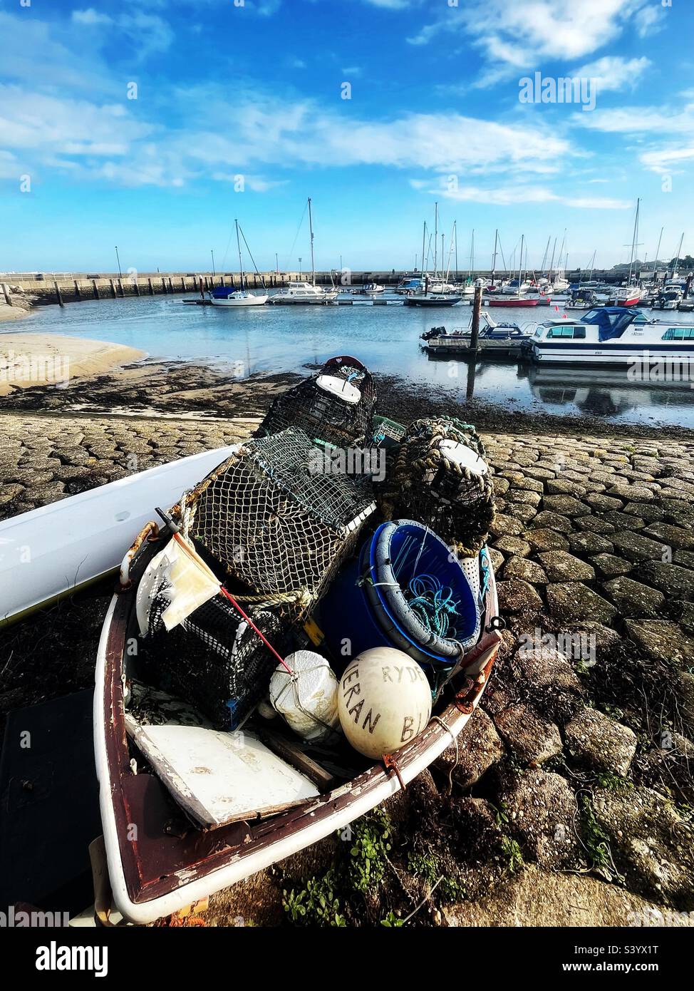 Boat with floats and pots in the marina at Ryde, Isle of Wight off the ...