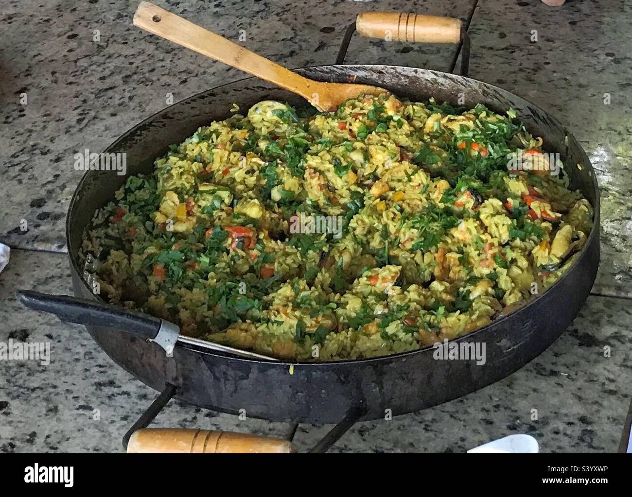 rice with seafood and green seasoning Stock Photo - Alamy