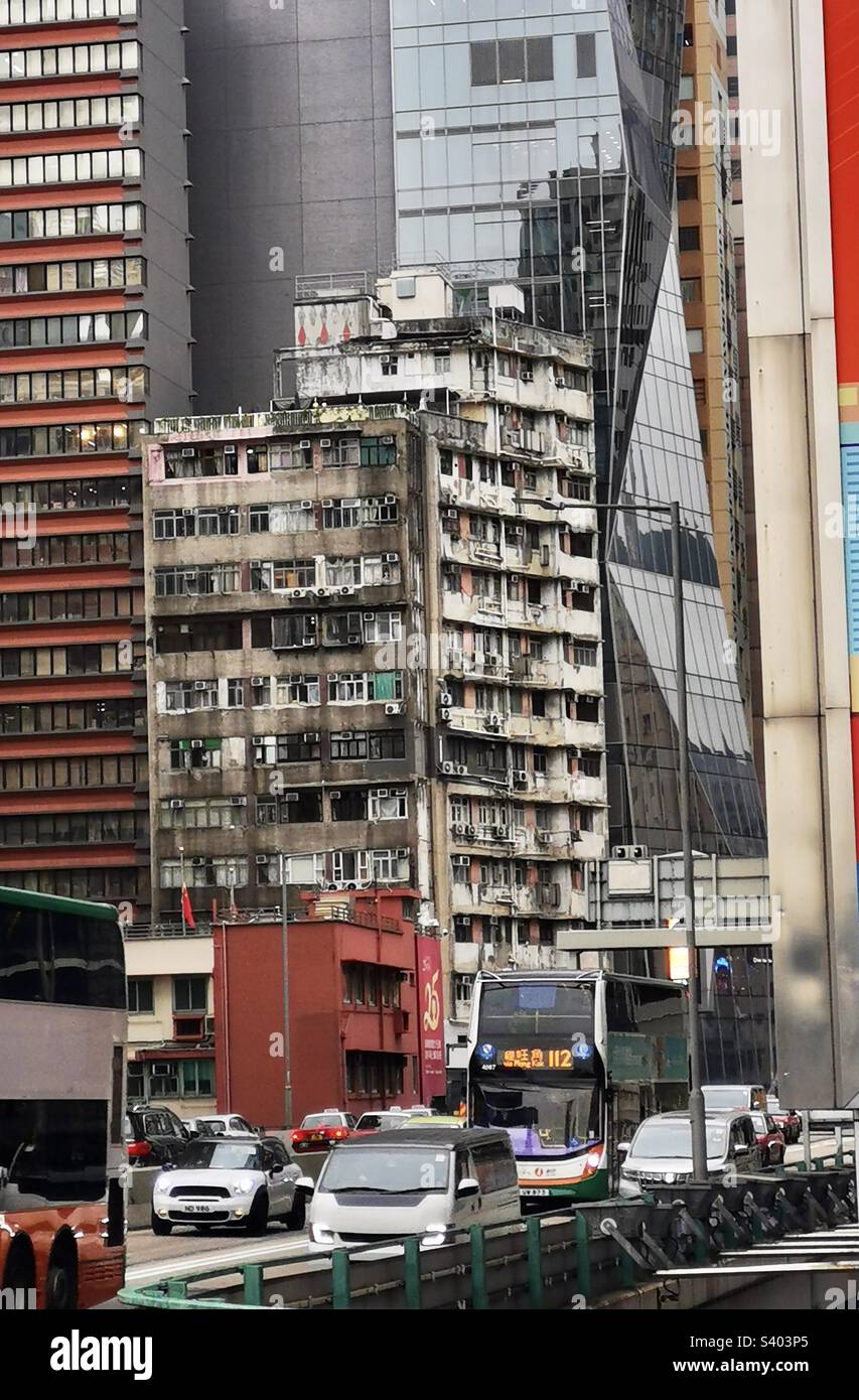 Old crumbling buildings replaced by modern buildings in Hong Kong Stock ...