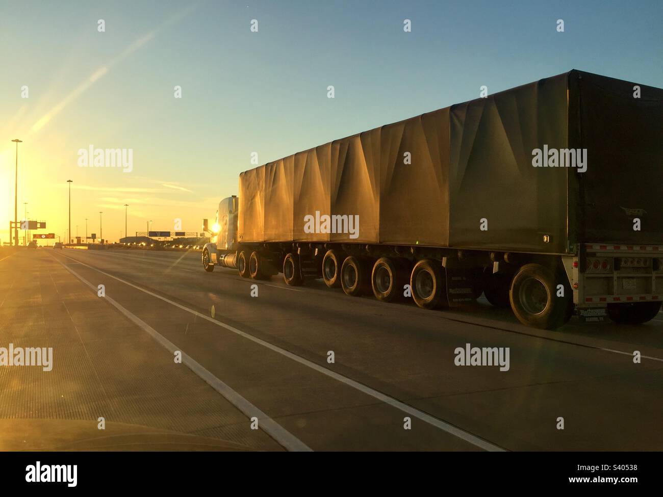 Very long truck on the motorway, Ontario, Canada. Highway 401 near ...