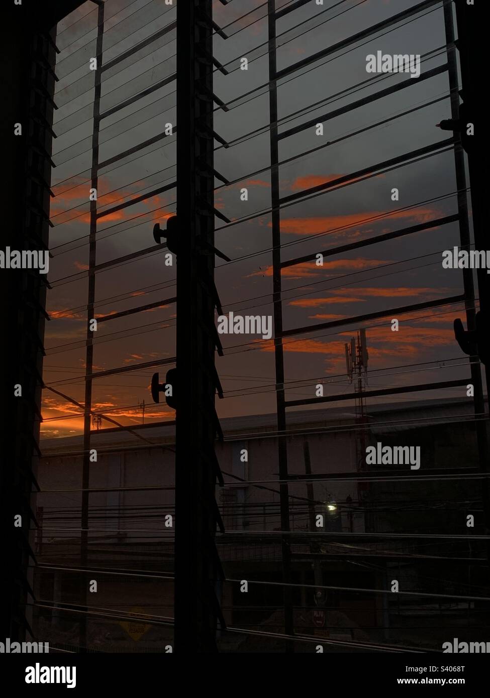 Sunrise through the window Stock Photo - Alamy