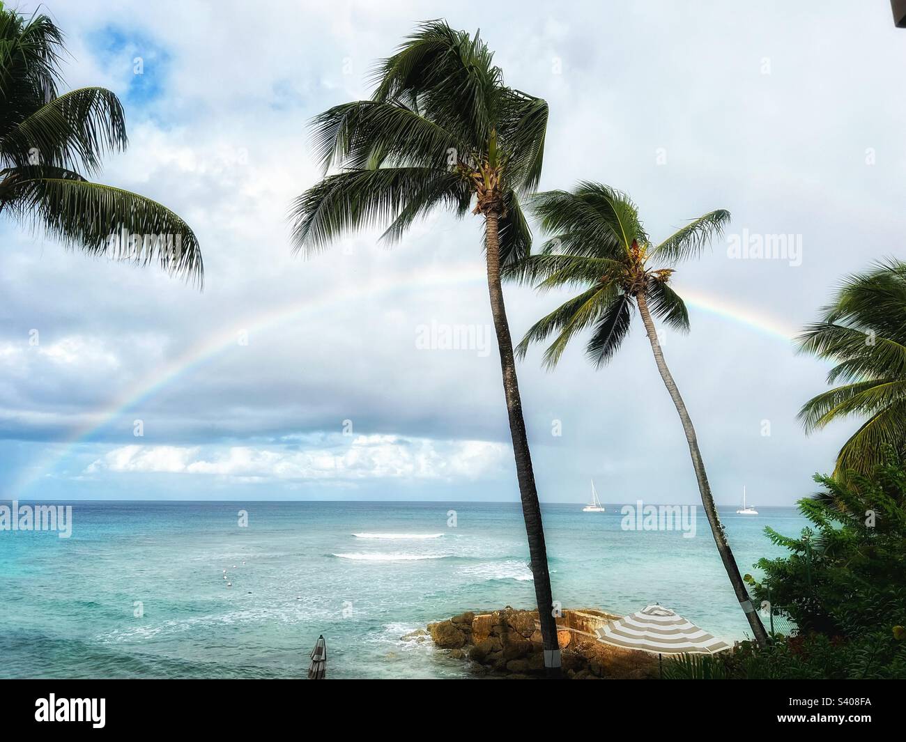 Rainbow over the Caribbean Sea in Barbados Stock Photo - Alamy